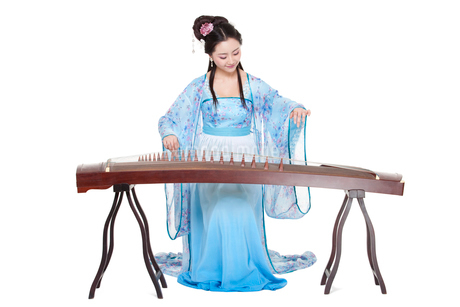 Young woman in Chinese traditional costume plucking Chineseの写真素材 ...